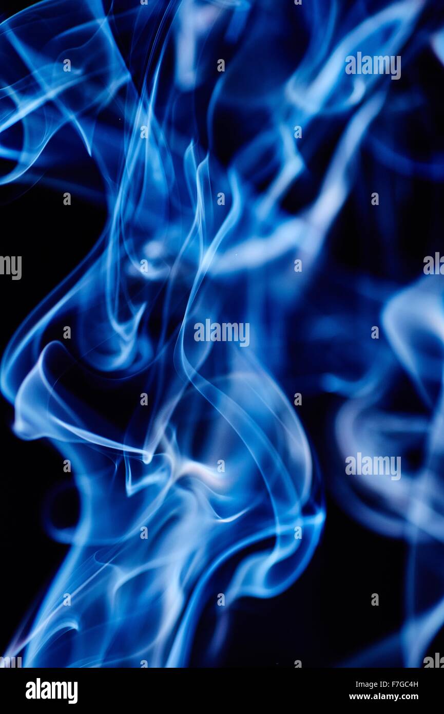 A studio photo of a insense candle smoke Stock Photo - Alamy