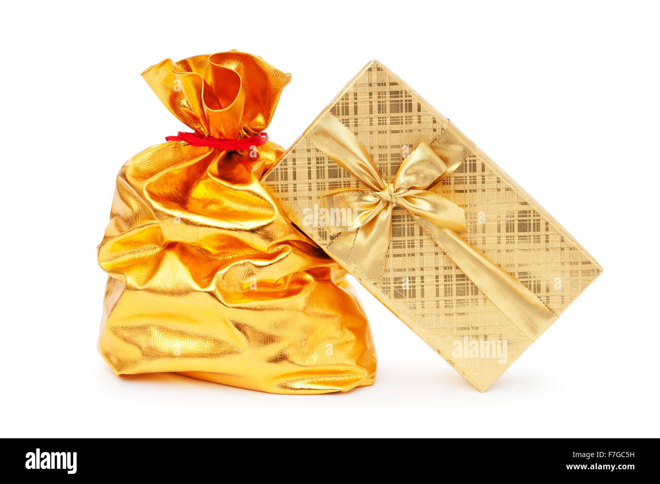 Gift boxes and golden sacks Stock Photo - Alamy
