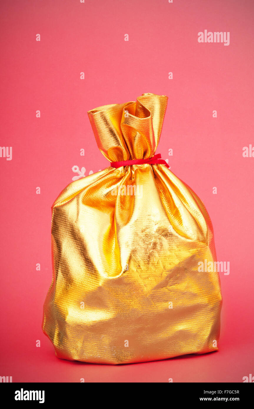 Golden sacks full of something good Stock Photo - Alamy