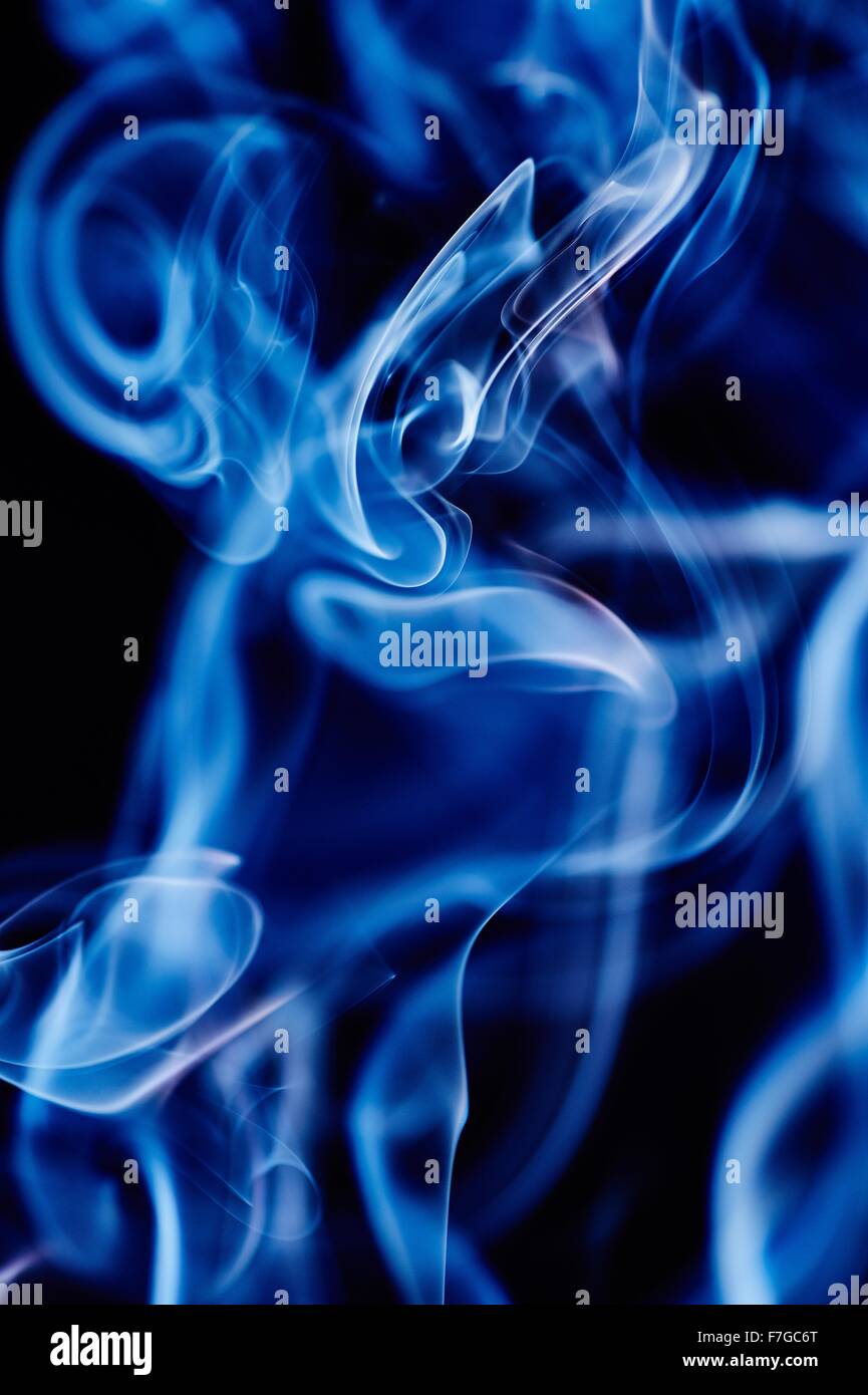 A studio photo of a insense candle smoke Stock Photo - Alamy