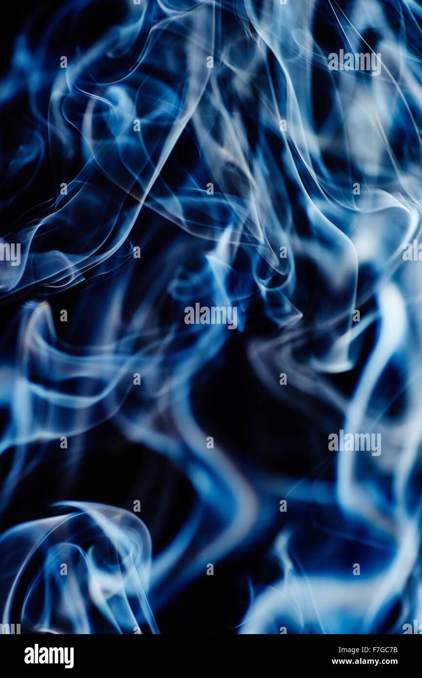 A studio photo of a insense candle smoke Stock Photo - Alamy