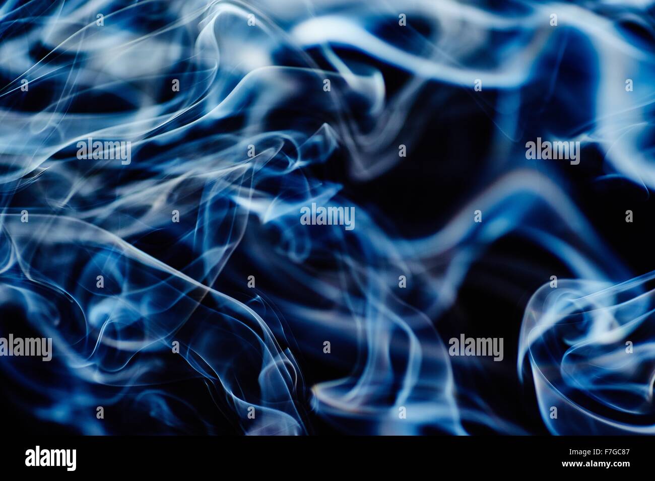 A studio photo of a insense candle smoke Stock Photo - Alamy