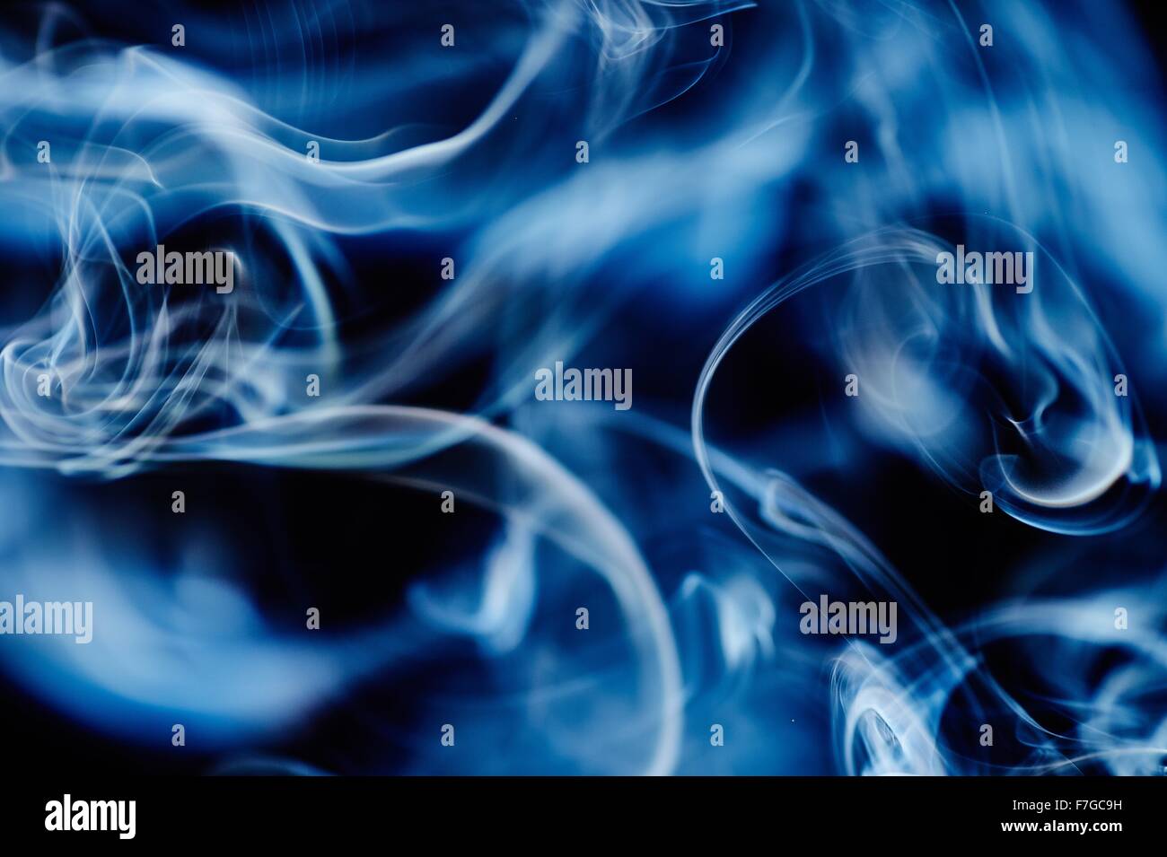 A studio photo of a insense candle smoke Stock Photo - Alamy