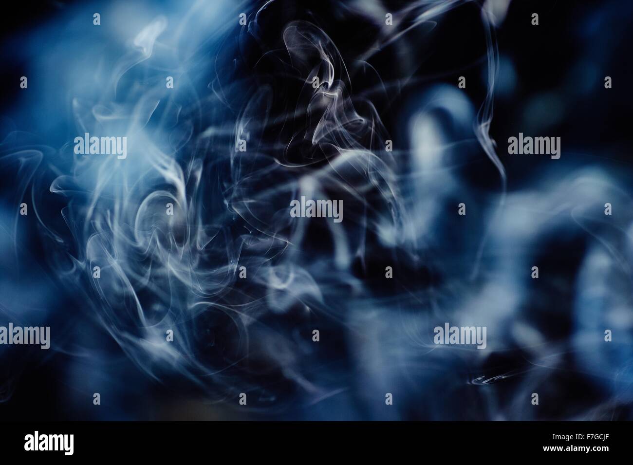 A studio photo of a insense candle smoke Stock Photo - Alamy