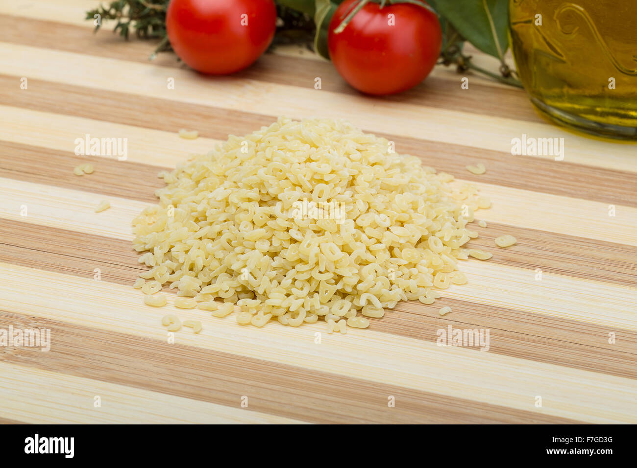 Raw ABC macaroni on the wood background Stock Photo - Alamy