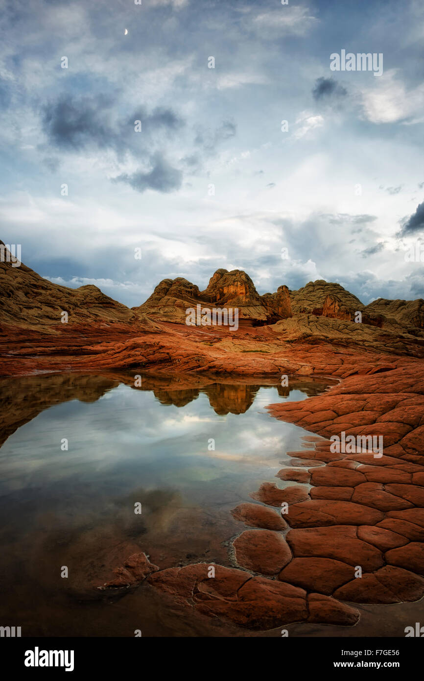 Moon rise over colorful sandstone formations in Arizona’s remote White ...