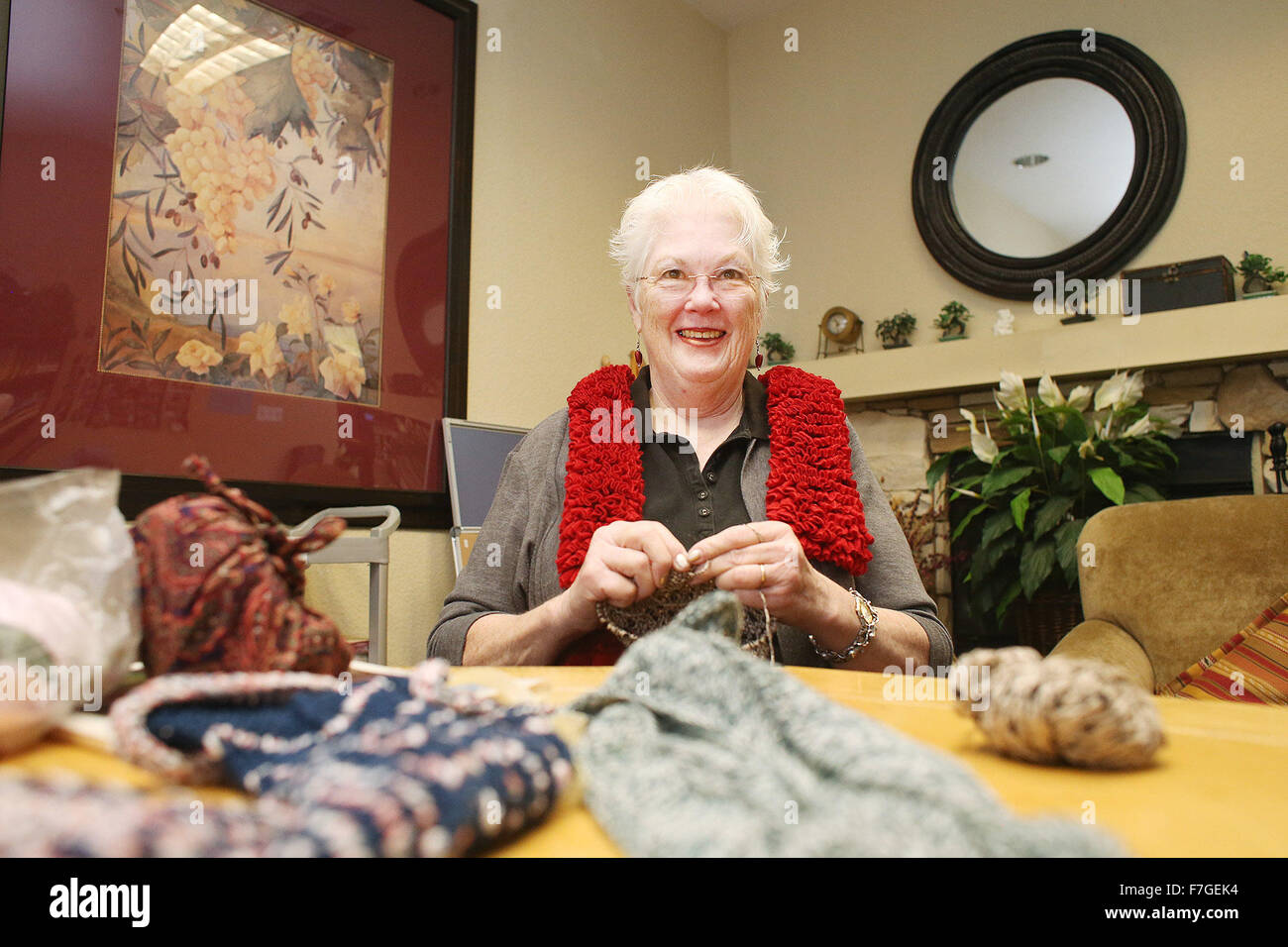 Napa, CA, USA. 28th Nov, 2015. Susan Blake knits in the club house at ...
