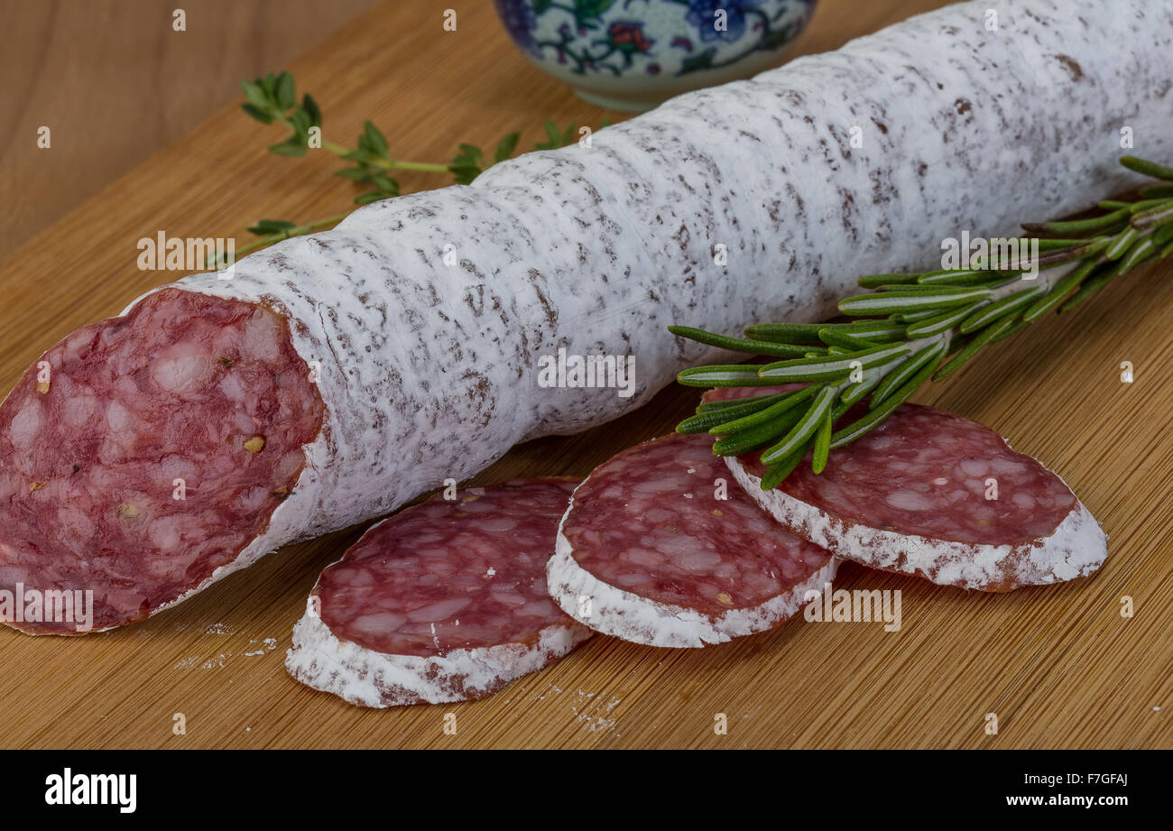 Fuet sausage - Spanish meat sliced with herbs Stock Photo - Alamy