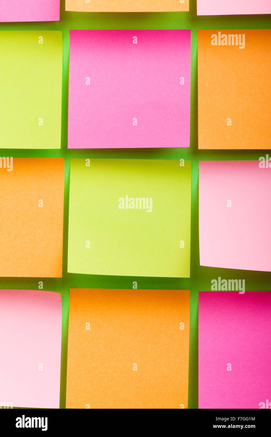 Reminder notes on the bright colorful paper Stock Photo - Alamy