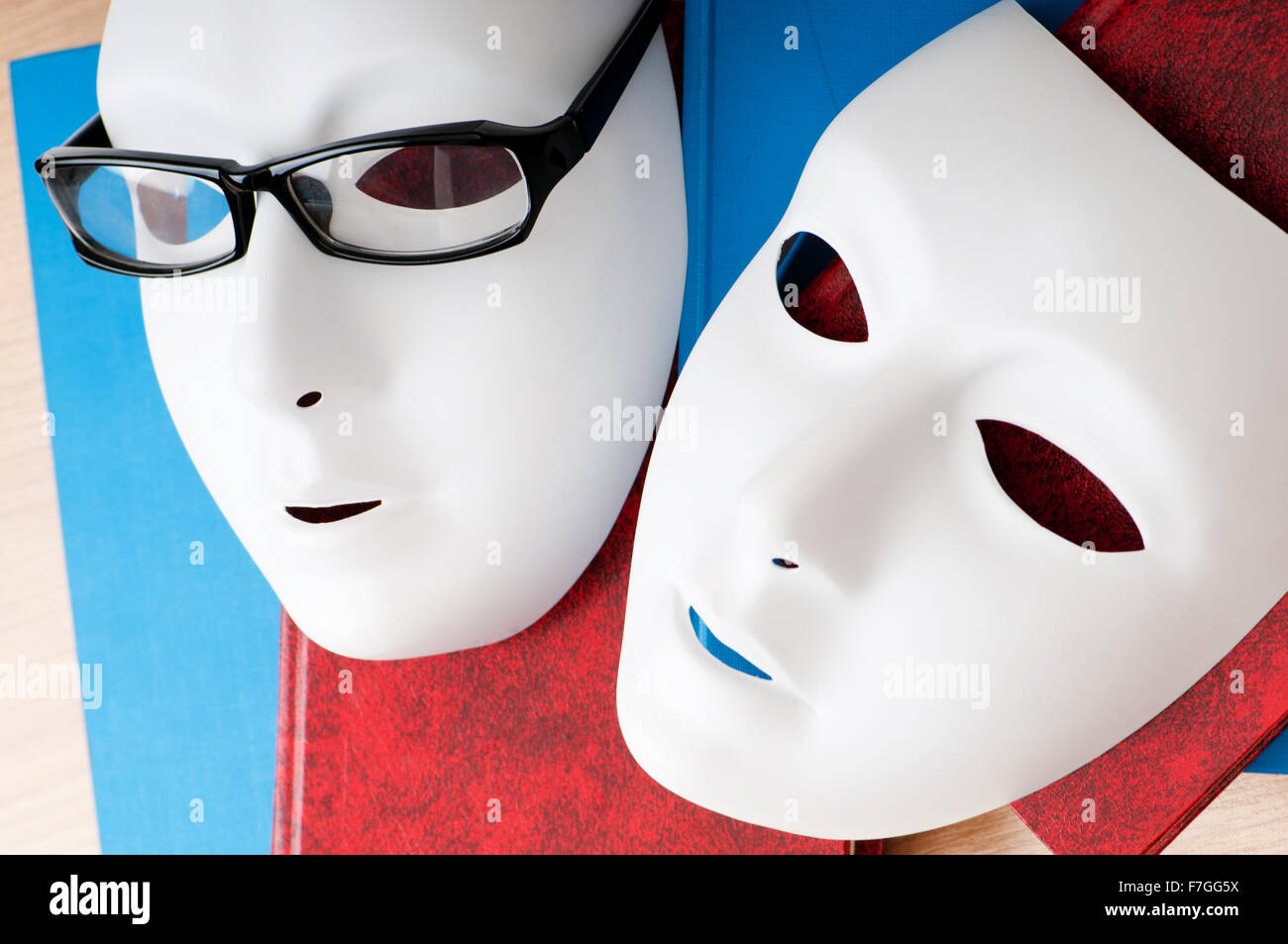 Reading concept with masks, books and glasses Stock Photo - Alamy