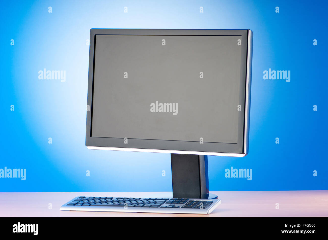 Wide screen computer monitor against colorful background Stock Photo ...