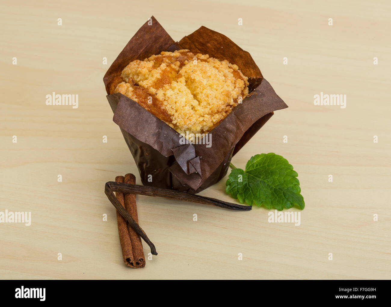 Fresh baked muffin on the wood background Stock Photo - Alamy