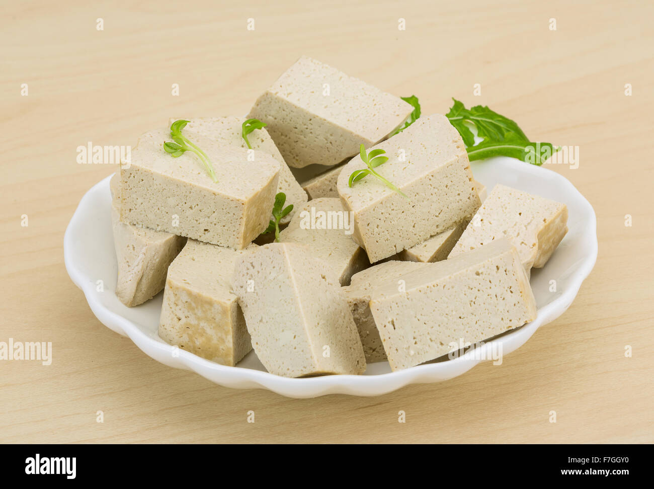 Tofu - soya cheese with herbs on the wood background Stock Photo - Alamy