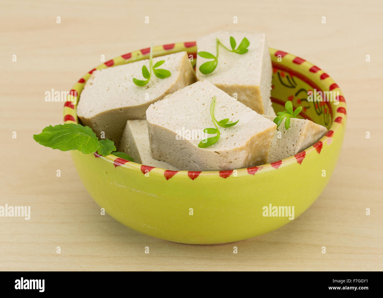 Tofu - soya cheese with herbs on the wood background Stock Photo - Alamy