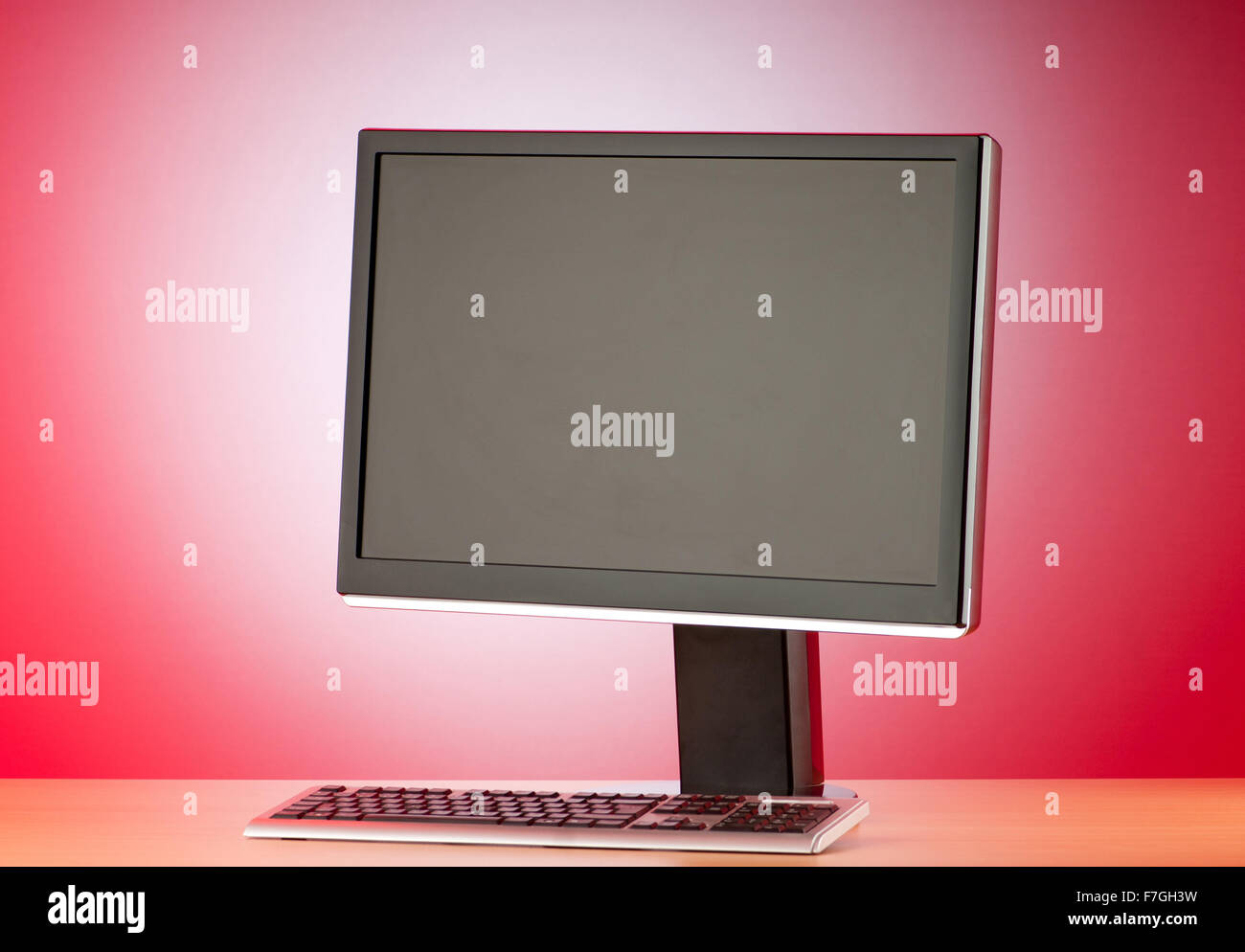 Wide screen computer monitor against colorful background Stock Photo ...