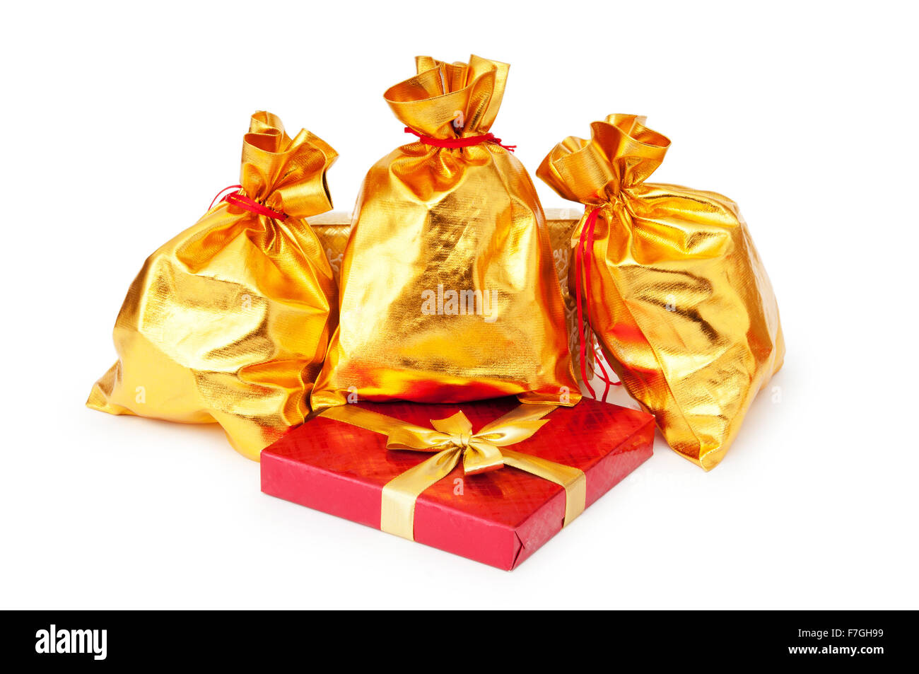 Gift boxes and golden sacks Stock Photo - Alamy