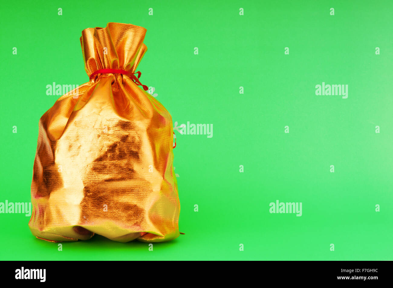 Golden sacks full of something good Stock Photo - Alamy