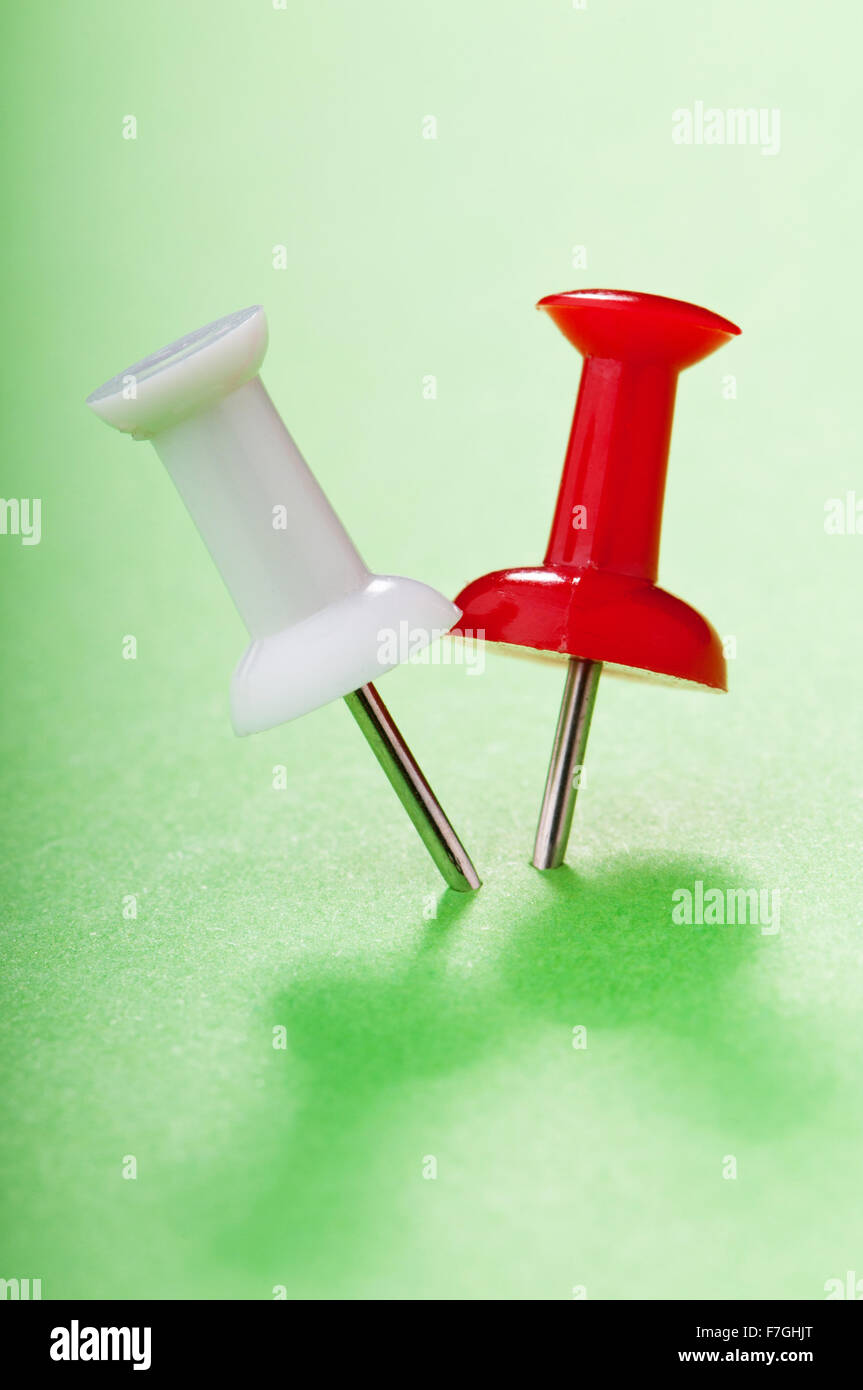 Office pins on the paper Stock Photo - Alamy