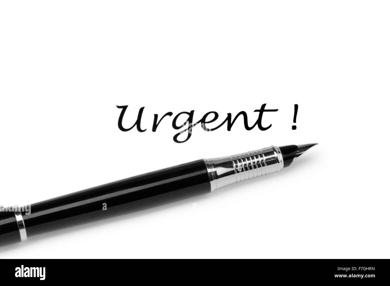 Pen and urgent message isolated on white Stock Photo - Alamy