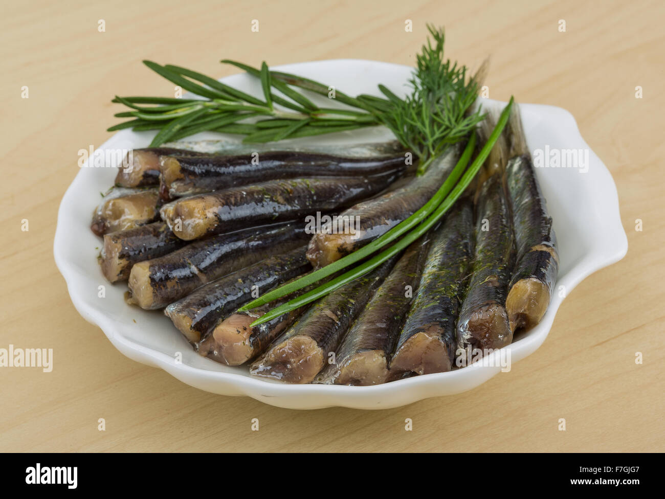 Salted anchovy with spices and herbs - ready for eat Stock Photo - Alamy