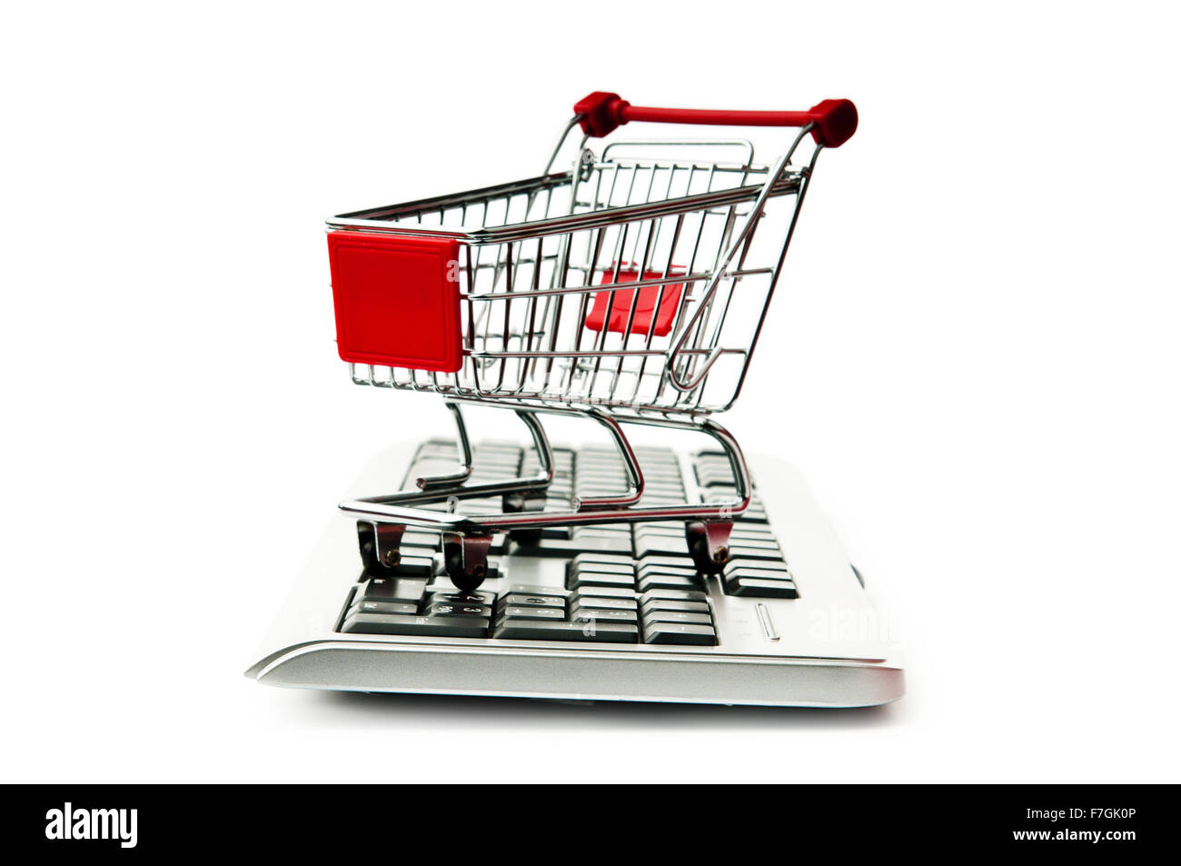 Internet online shopping concept with computer and cart Stock Photo - Alamy