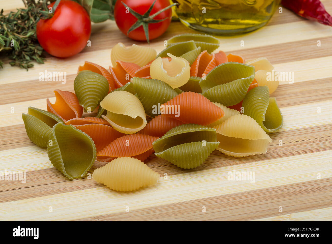 Pipe rigate pasta on the wood background Stock Photo - Alamy