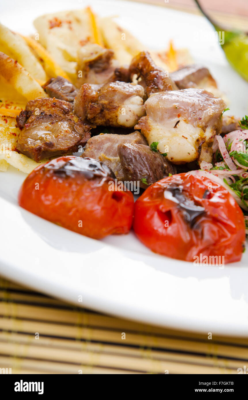 Meat cuisine - kebab served in plate Stock Photo - Alamy