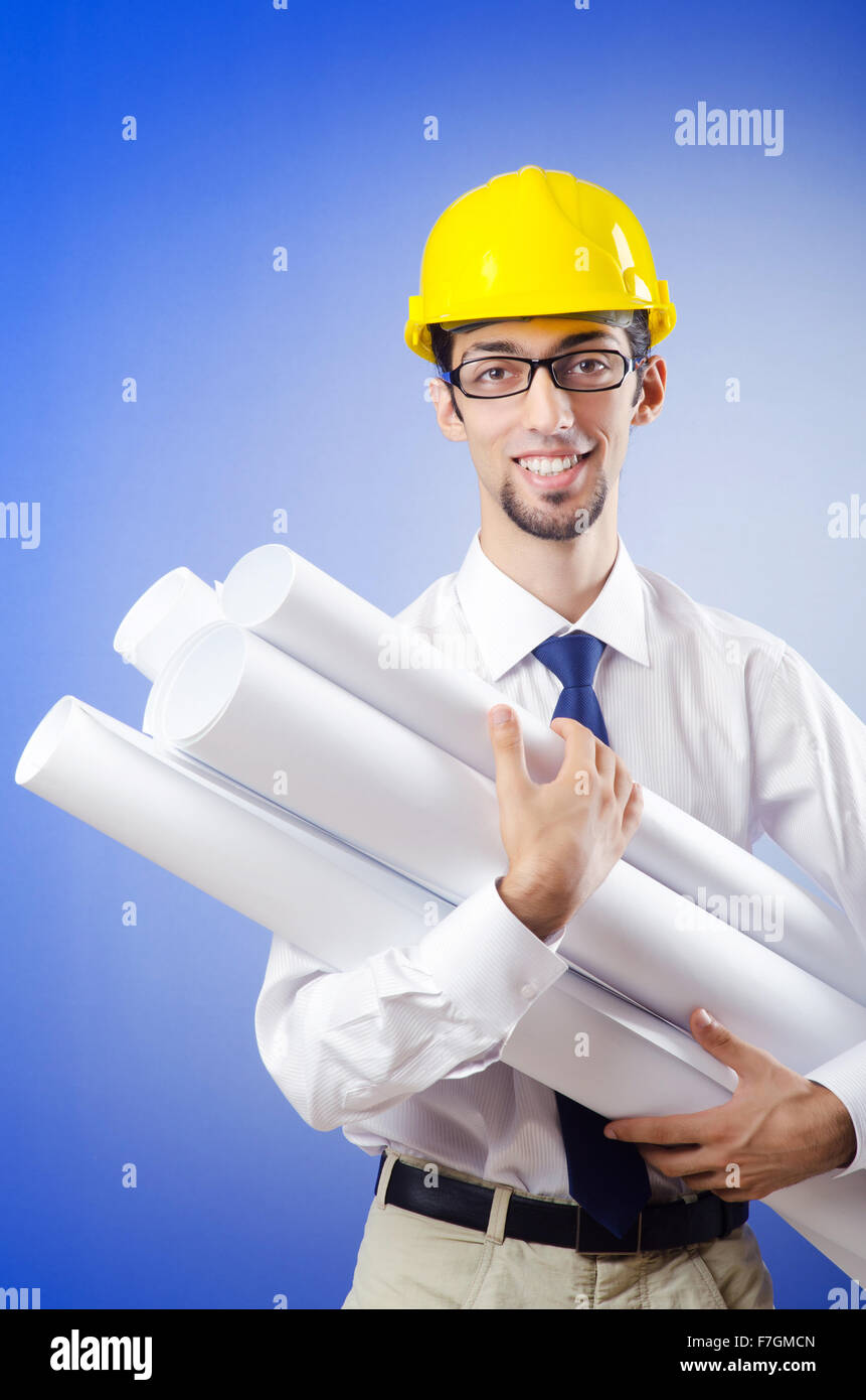 Young engineer working with drawings Stock Photo - Alamy