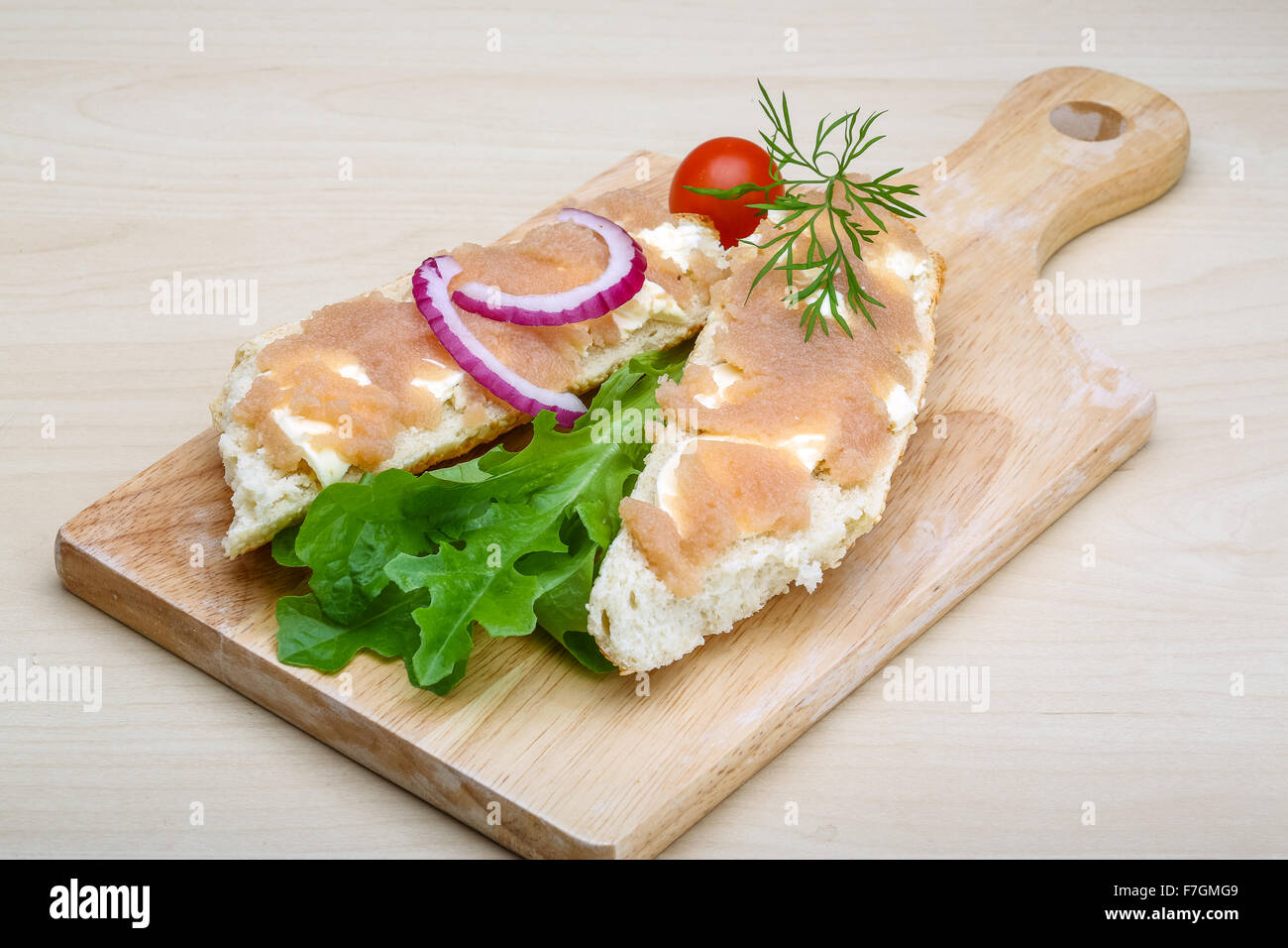 Sandwich with cod roe, salad, onion and dill Stock Photo - Alamy