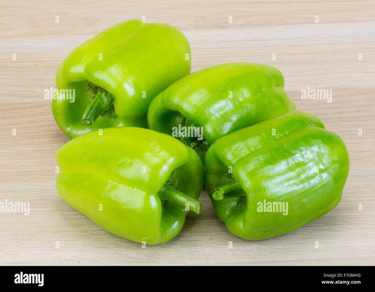 Fresh ripe Green pepper on the wood background Stock Photo - Alamy