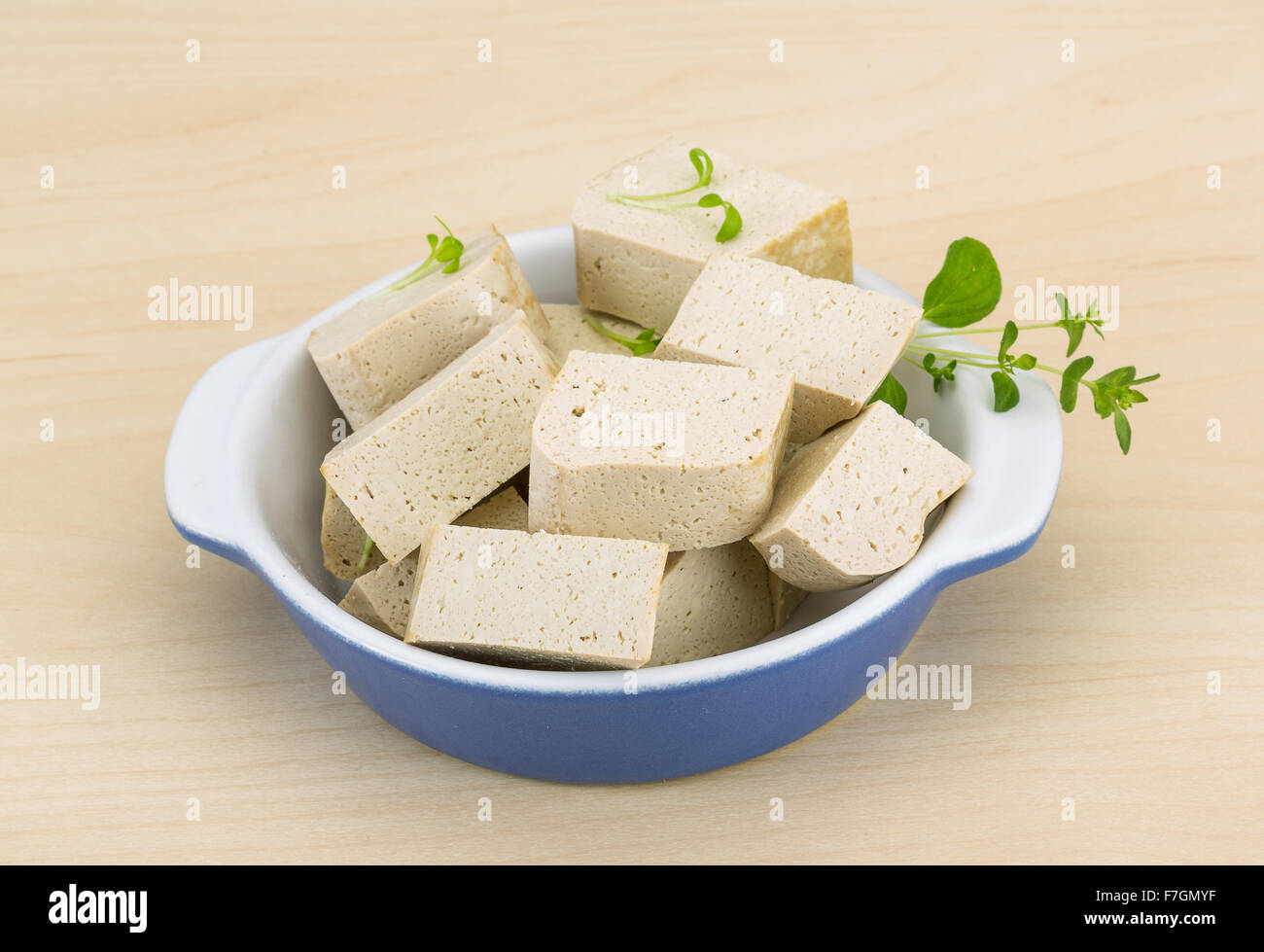 Tofu - soya cheese with herbs on the wood background Stock Photo - Alamy