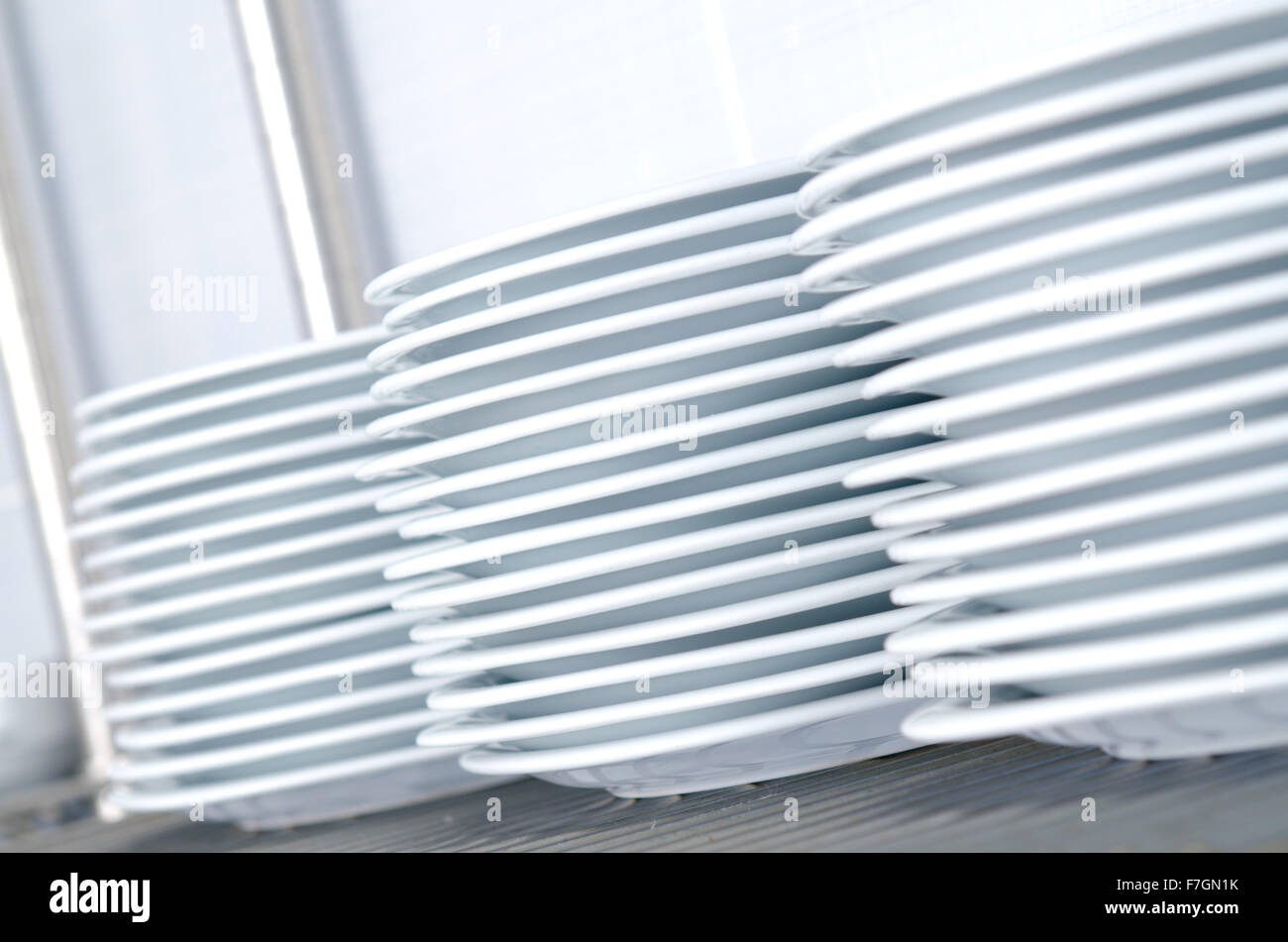 Many plates in the kitchen Stock Photo - Alamy