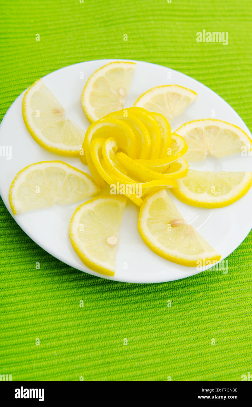 Lemon slices served in the plate Stock Photo - Alamy