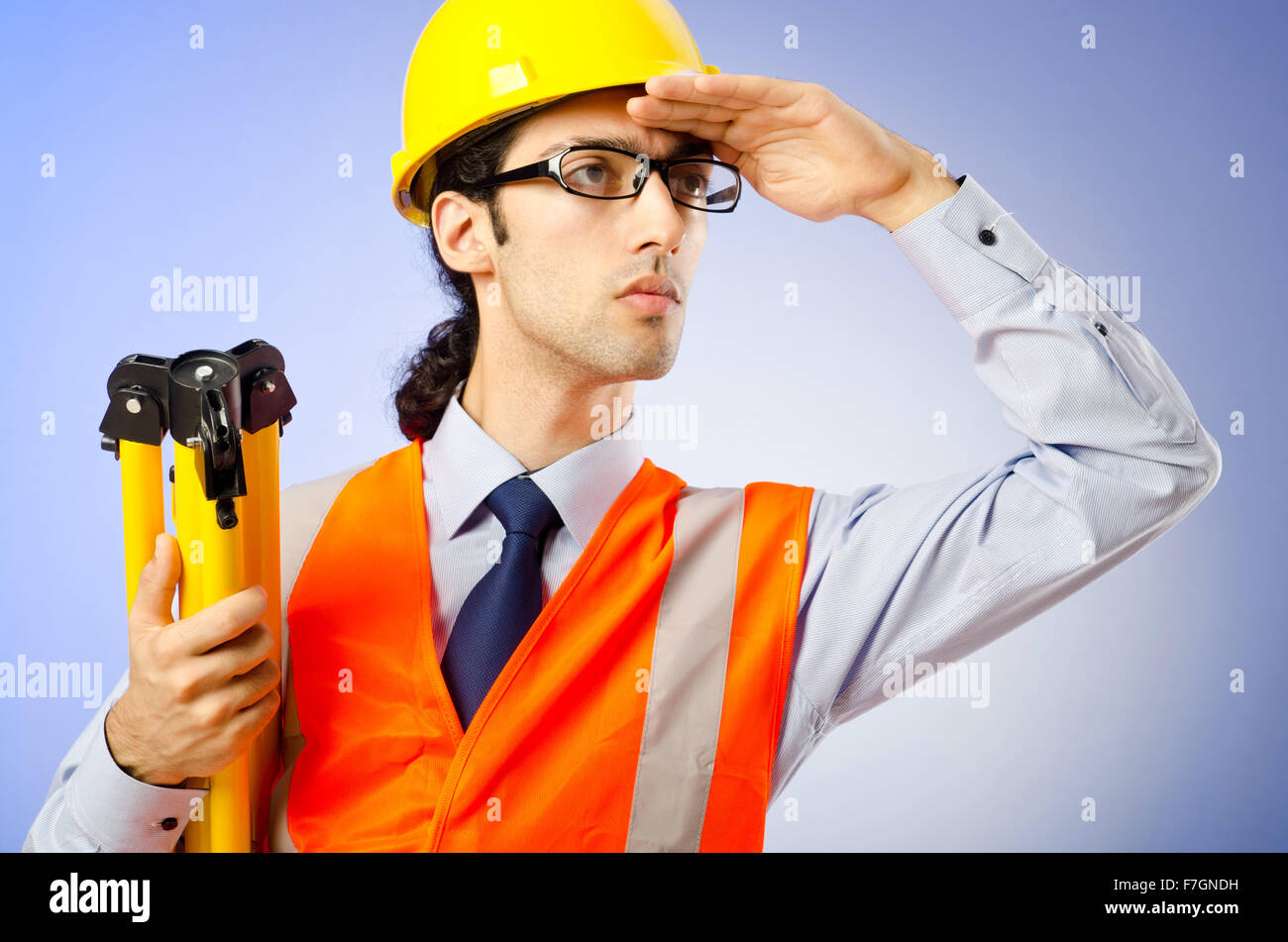 Young construction worker with hard hat Stock Photo - Alamy