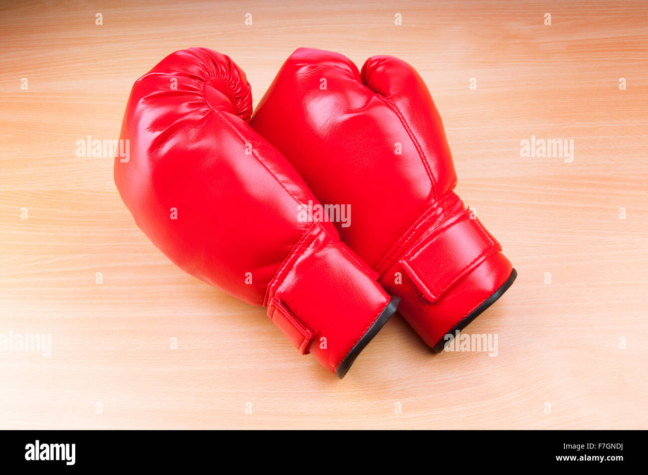 Boxing gloves on the table Stock Photo - Alamy