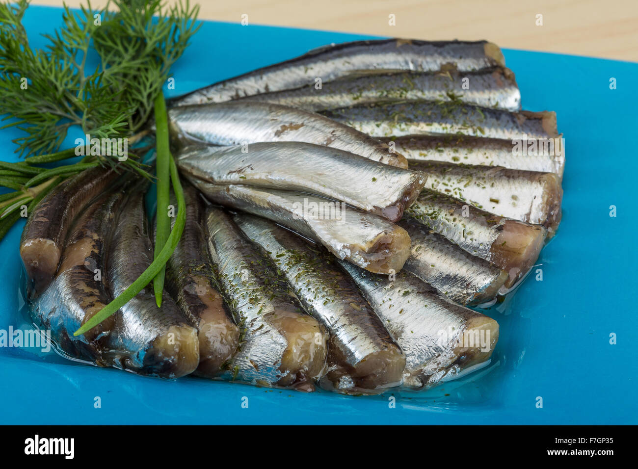 Salted anchovy with spices and herbs - ready for eat Stock Photo - Alamy