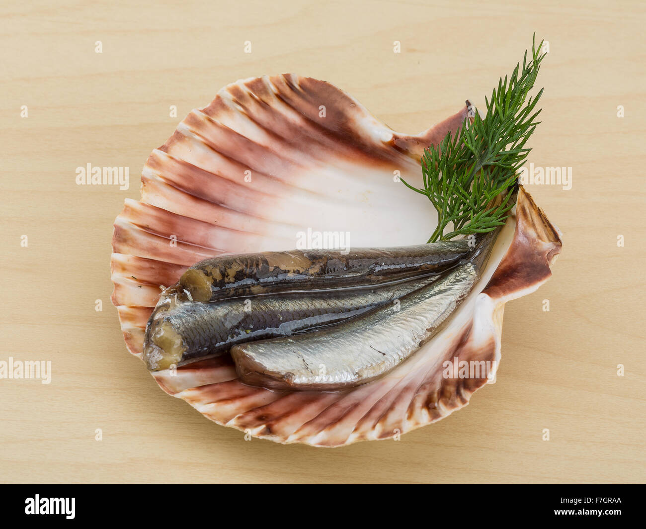 Salted anchovy with spices and herbs - ready for eat Stock Photo - Alamy