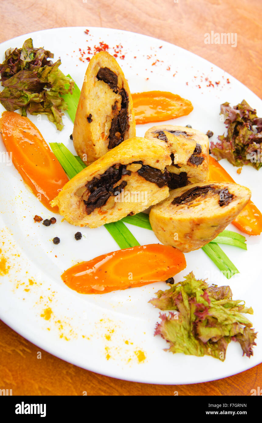 Meat and vegetable roll in plate Stock Photo - Alamy