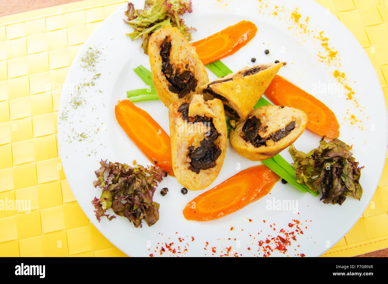 Meat and vegetable roll in plate Stock Photo - Alamy