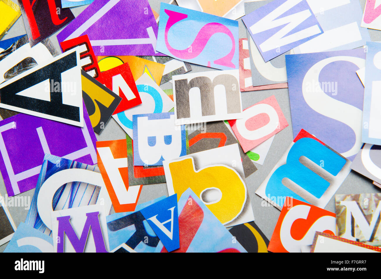 Newspaper clippings with various letters Stock Photo - Alamy