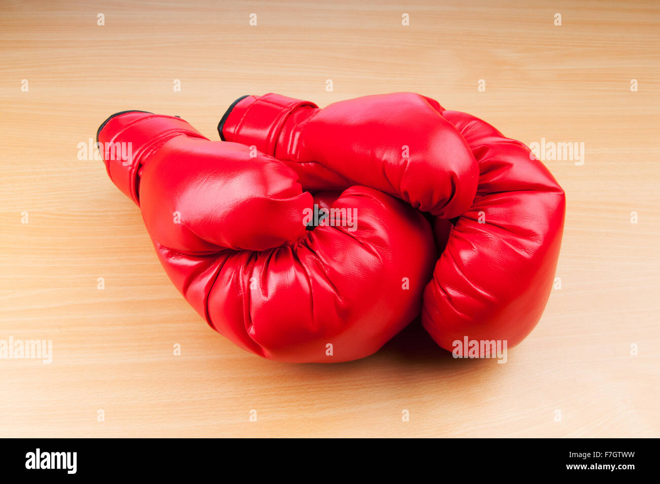 Boxing gloves on the table Stock Photo - Alamy