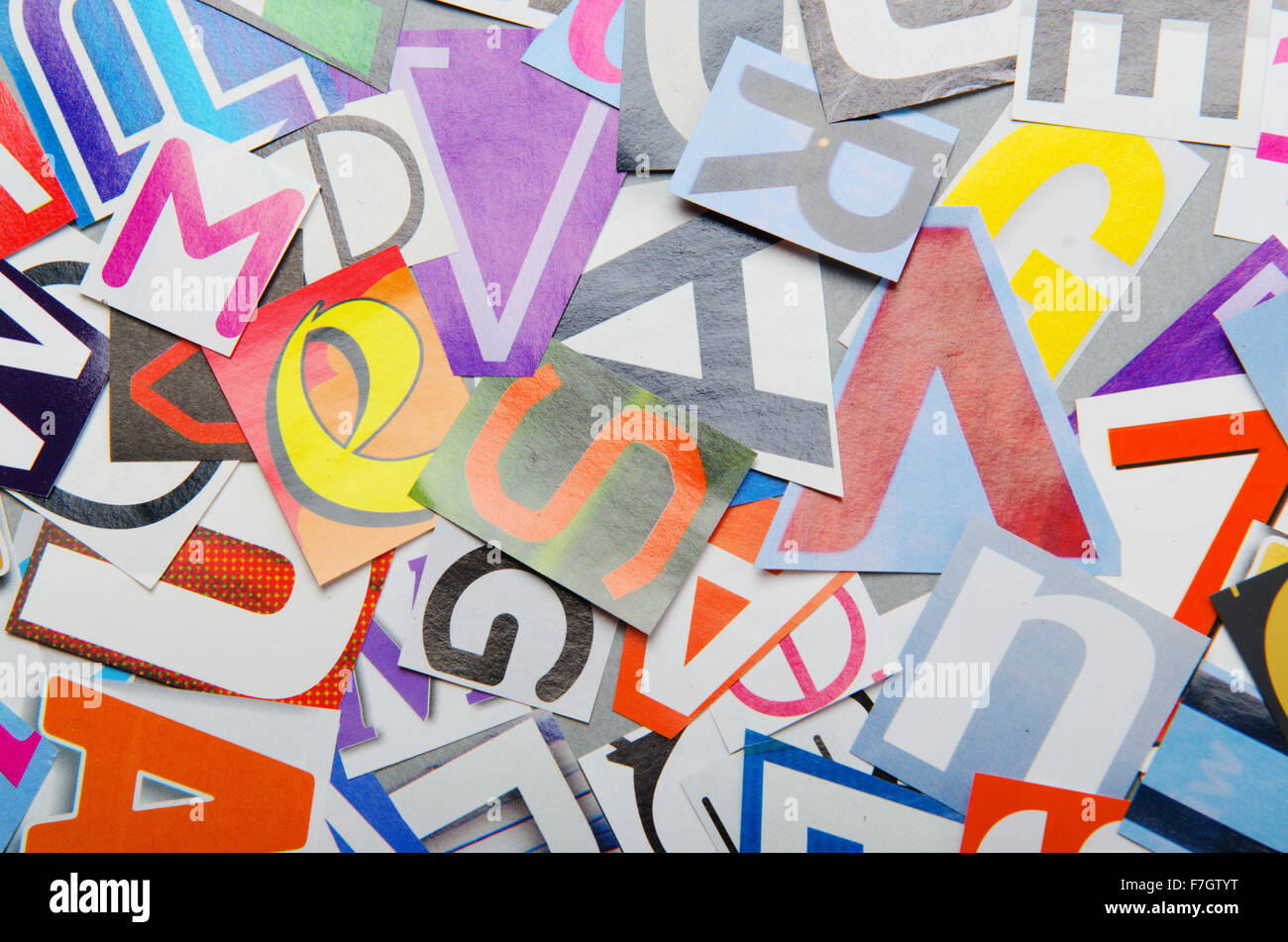 Newspaper clippings with various letters Stock Photo - Alamy