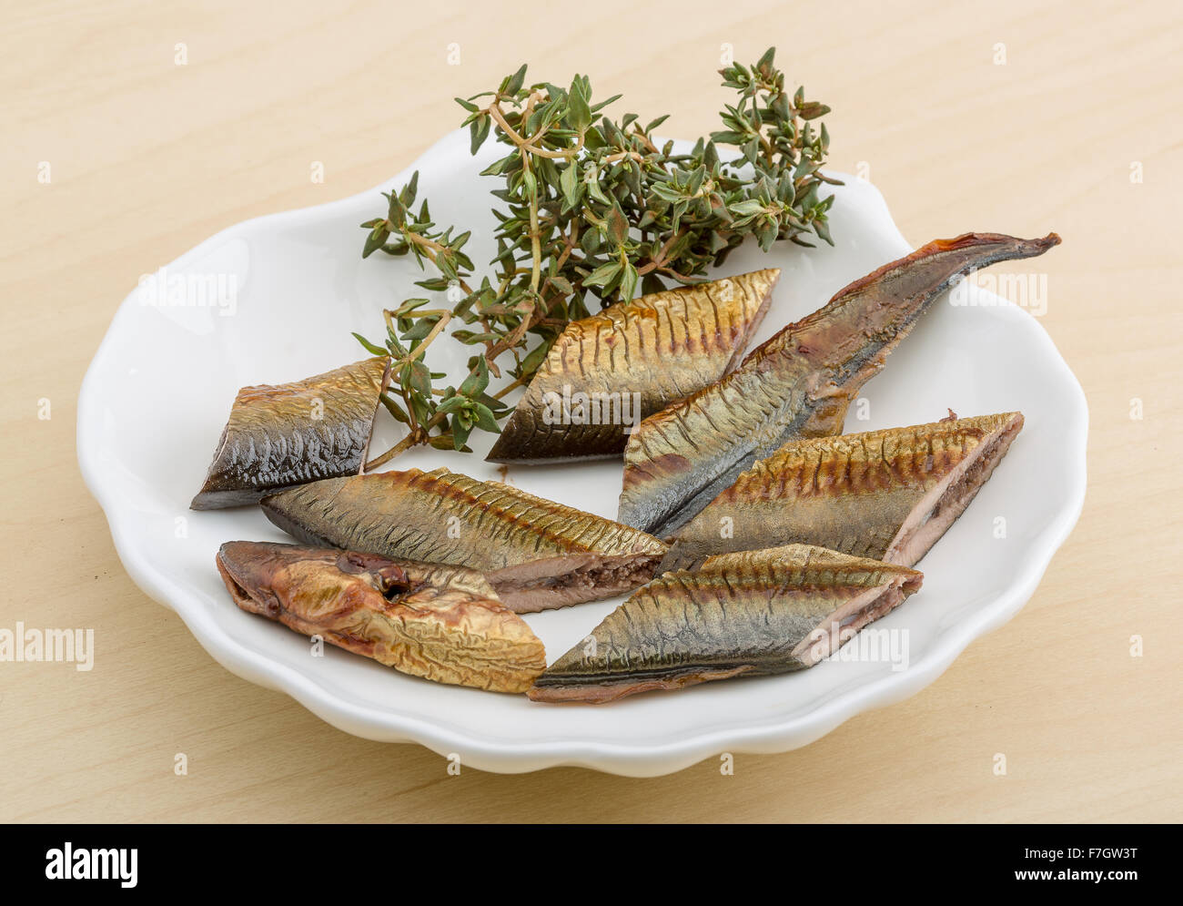 Smoked Lamprey - seafood delicacy with salad and herbs Stock Photo - Alamy