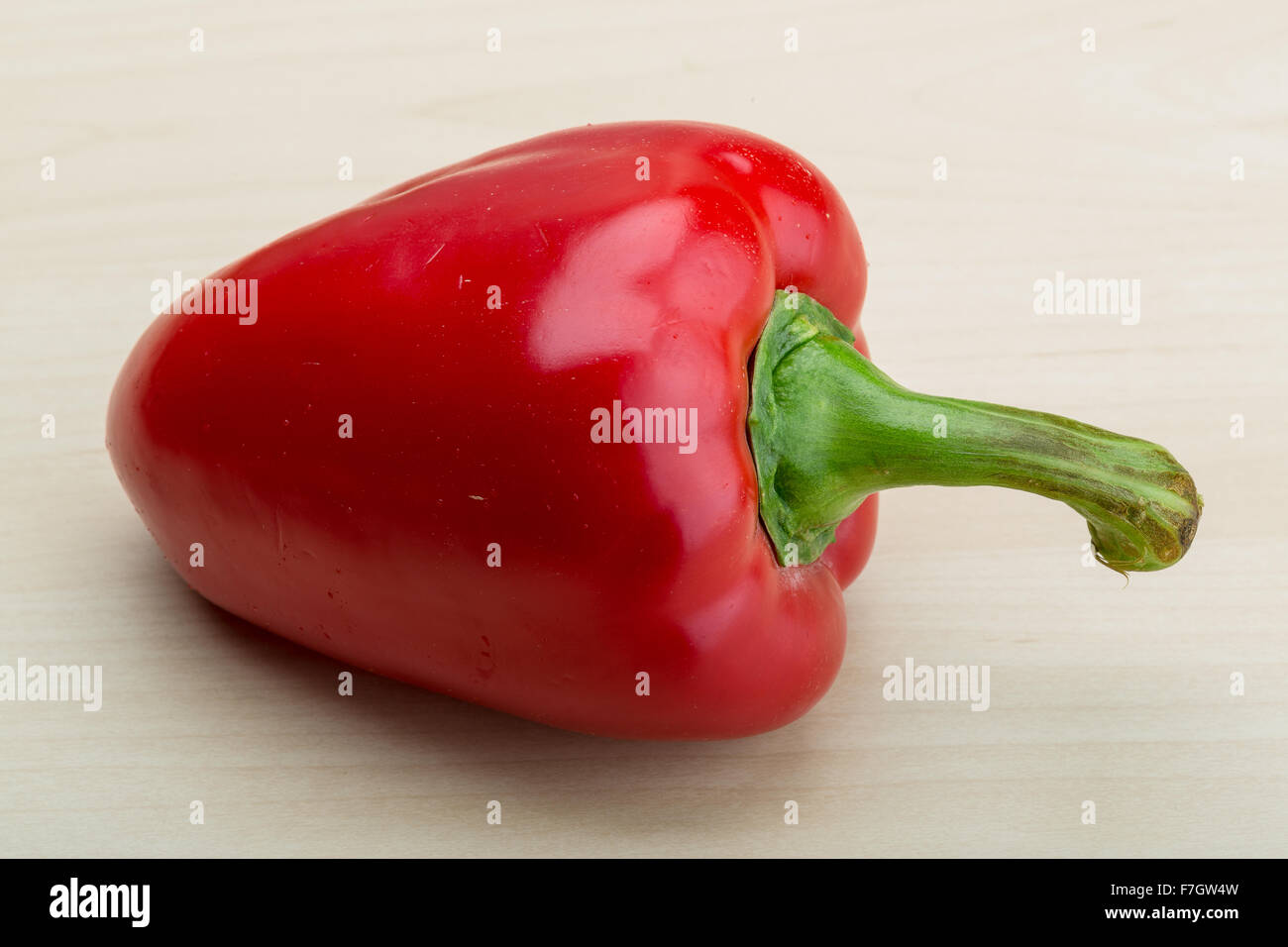 Fresh ripe Red bell pepper on the wood background Stock Photo - Alamy