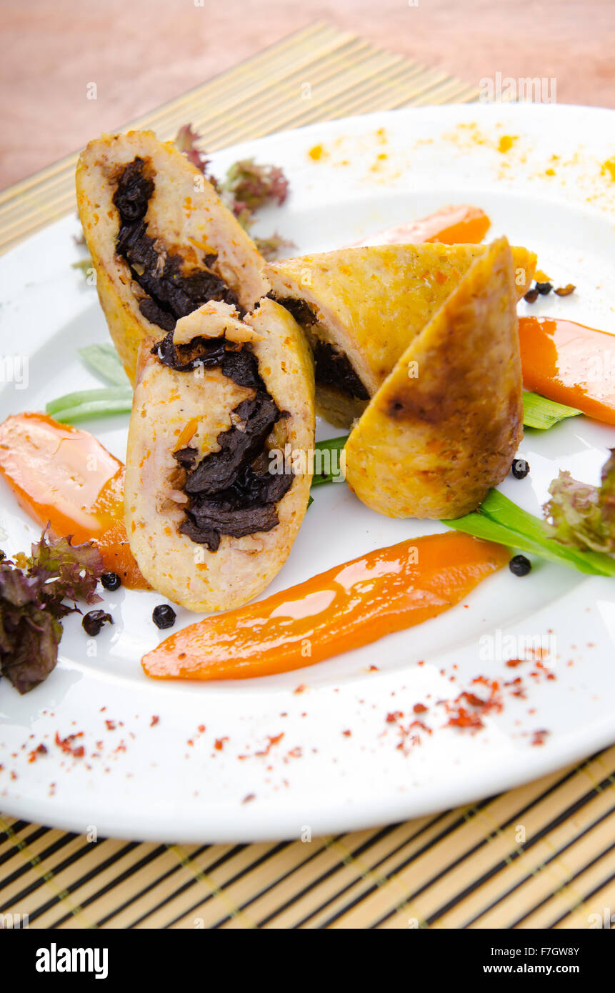 Meat and vegetable roll in plate Stock Photo - Alamy