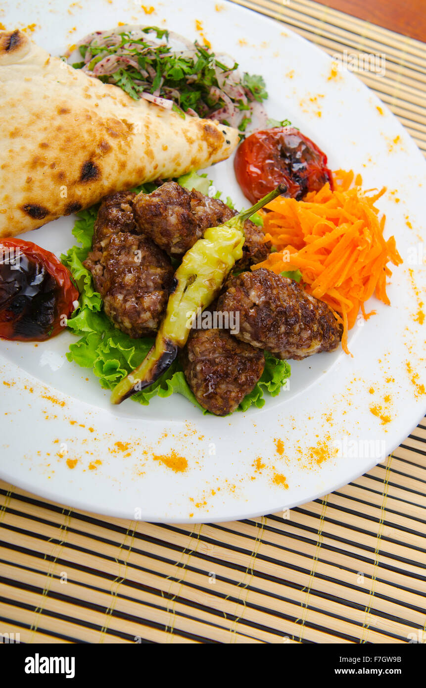 Meat cuisine - kebab served in plate Stock Photo - Alamy