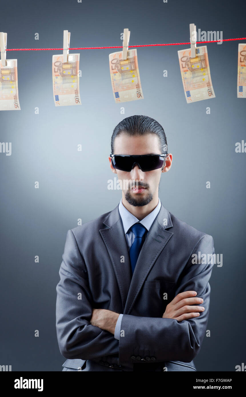Money laundering dollars bills greed hi-res stock photography and ...