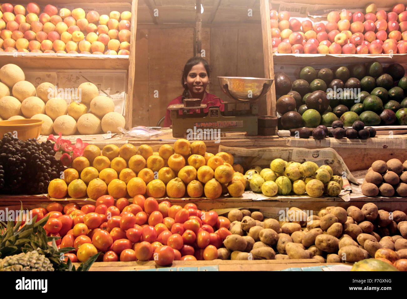 Young Indian Lady Selling Fruit at stall, Goa, India Stock Photo - Alamy
