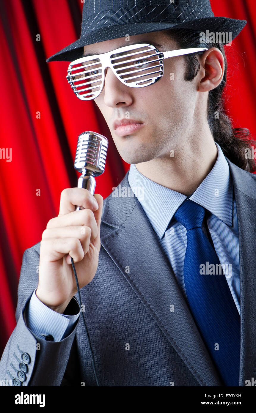 Man performing at the concert Stock Photo - Alamy