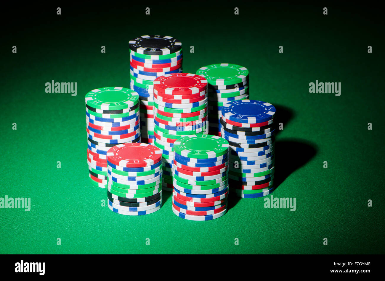 Stack of casion chips on table Stock Photo - Alamy